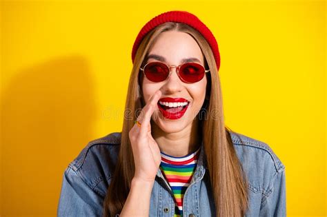 Smiling Young Woman In Stylish Attire Wearing Red Sunglasses And
