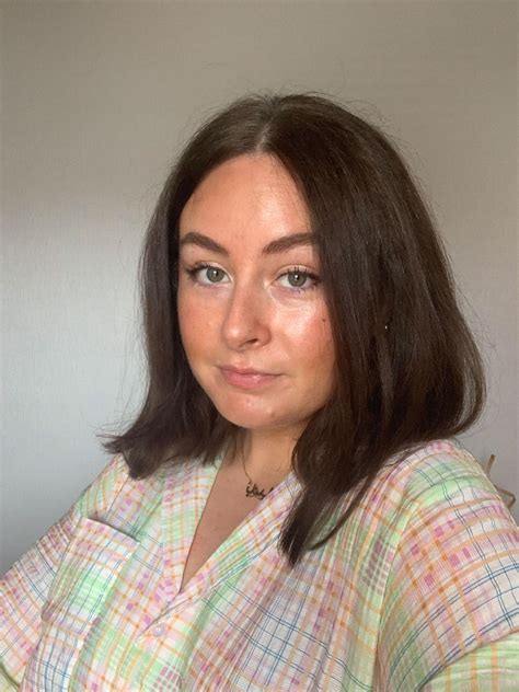 Woman Embraces Her Grey Hair In Her Twenties