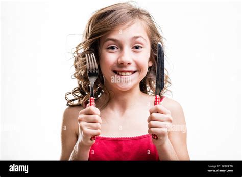 Girl Ready To Eat As Much As She Can Stock Photo Alamy
