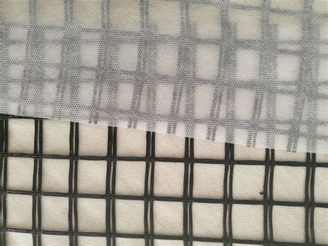 100 100kn Fiberglass Geogrid Composited With 50g Nonwoven Fabric