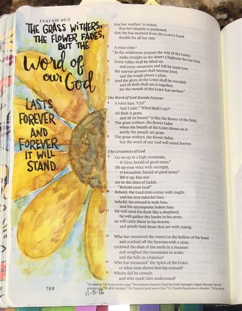 An Open Bible With Yellow Flowers And Words On The Page In Front Of
