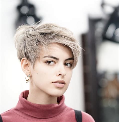 Messy Feathered Pixie With Side Swept Bangs The Latest Hairstyles For