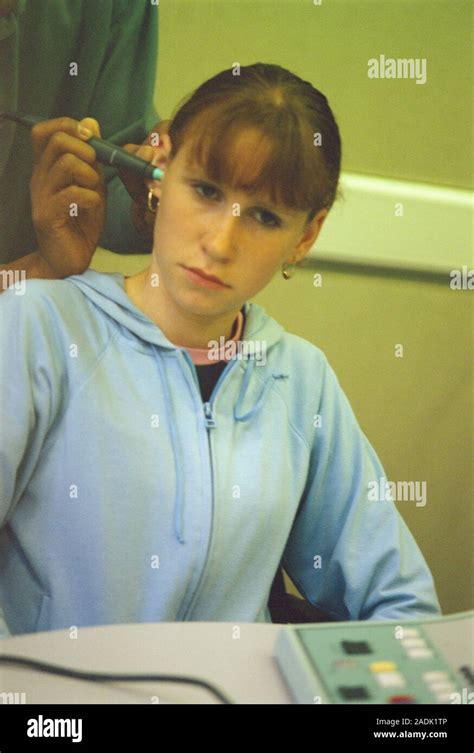 Tympanometry Examination Teenage Girl Having Tympanometry To Measure The Movement Of The