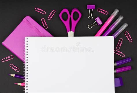 Blank Notepad With Pink And Purple School Supplies On Black Background