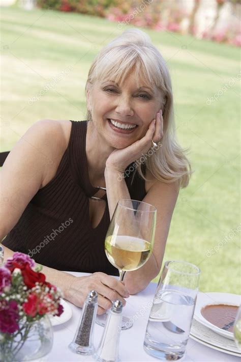 Woman Enjoying Glass Of Wine Stock Photo By Londondeposit 33810147