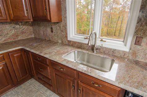 Crema Bordeaux Granite With Full Backsplash Traditional Kitchen