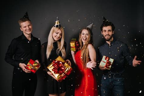 Premium Photo Two Attractive Guys And Two Beautiful Girls Holding In