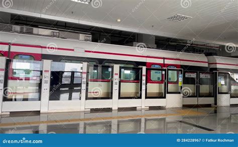 Jakarta Lrt Train Departs From Velodrome Station Stock Video Video Of