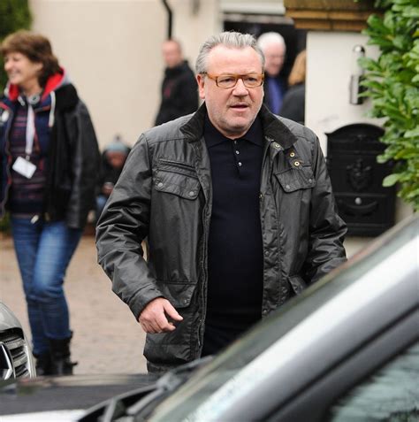 Pictured Ray Winstone All Smiles Despite Filming In Manchester Drizzle