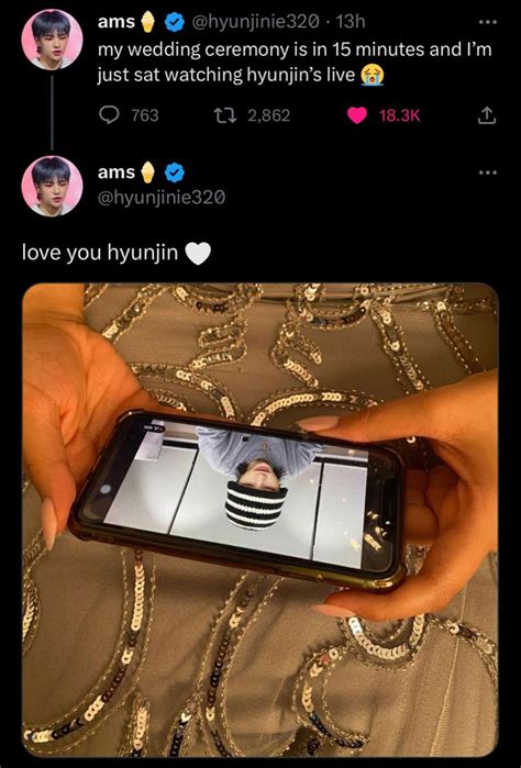 Someone Is Holding Up Their Cell Phone To Take A Selfie With The Same