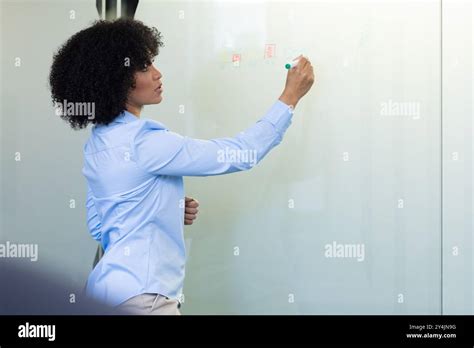 Presenting Ideas Businesswoman Writing On Whiteboard During Office