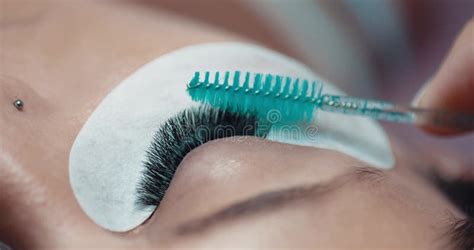 Eyelash Extension Test With Brush On Female Model Checking Procedure For Lashes Close Up
