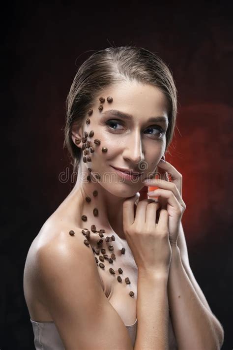 Beautiful Girl With Naked Shoulders Coffee Beans Were Artistically