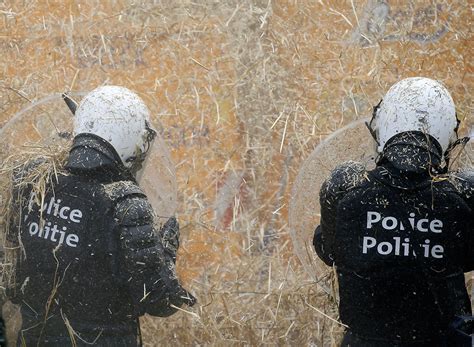 Belgium Milk Protests Farmers Throw Eggs Hay And Fireworks At Riot