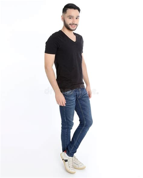 Long Shot Of An Attractive Caucasian Male Model Posed Smiling In A