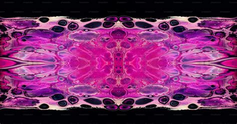 黒い背景にピンクと紫の模様の写真 パターン Unsplashの写真