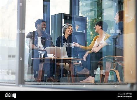 They Make Meetings Look Like Fun A Team Of Creative Businesspeople