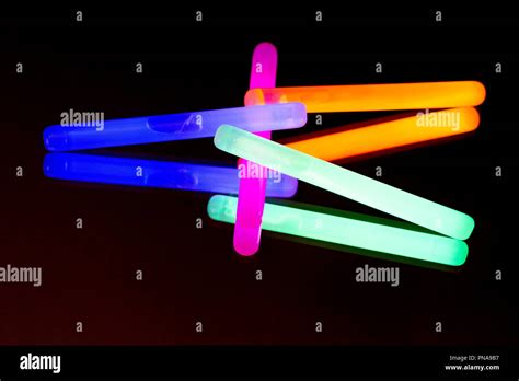 Colorful Fluorescent Light Neon Glow Stick On Mirror Reflection Black