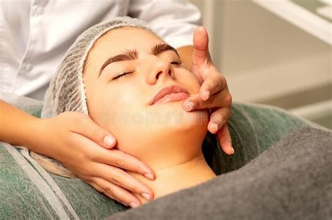 Face Massage Beautiful Caucasian Young White Woman Having A Facial