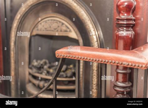 Leather Antique Corner Seating And Fire Surround With Brass Studs Iron