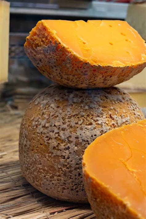 Pieces Of Native French Aged Cheese Mimolette Produced In Lille With Greyish Curst Made By
