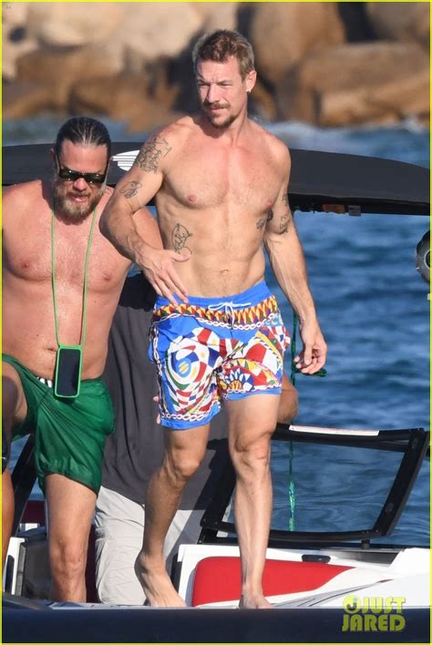 Diplo Goes Shirtless In Sardinia Jumps In The Water During Italian