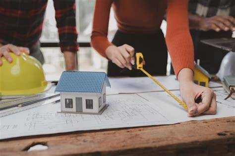 Premium Photo Group Architects And Engineers Build Houses And