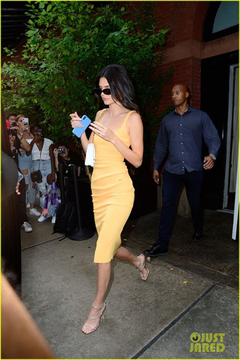 Kendall Jenner Rocks Orange Dress While Buying Orange Coke Photo