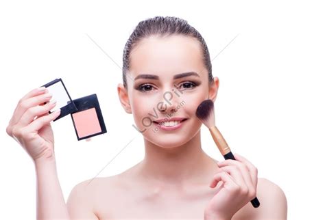 Woman Applying Makeup Using Cosmetics In Beauty Concept Photo Picture