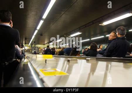 Passengers On Escalator At Fortress Hill Station On Mtr Metro Subway In