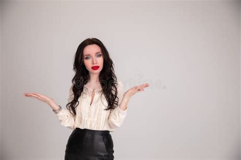 Angry Young Business Woman Spreads Her Hands Stress Irritability