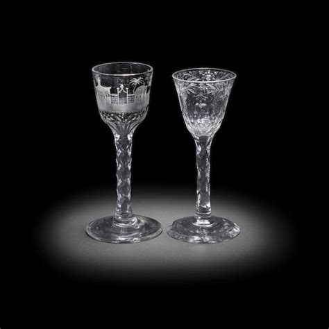 Bonhams Two Engraved Facet Stem Wine Glasses Circa 1775 85