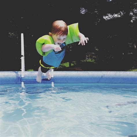 Premium Photo Girl Jumping In Swimming Pool