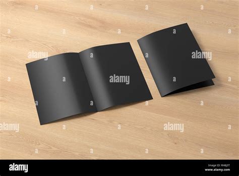 Blank Black Open And Folded Half Folded Flyer Leaflet On Wooden
