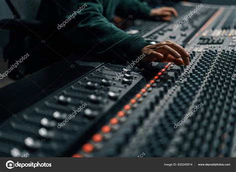 sound engineer used digital audio mixer sliders engineer presses key