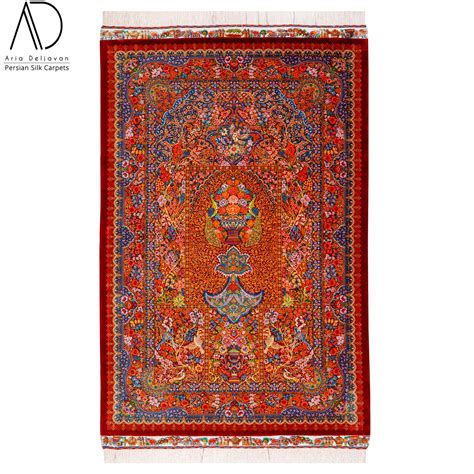 فرش دستباف ذرع نیم تمام ابریشم مارک عربلو نقشه طاووس زمینه پرتقالی لاکی