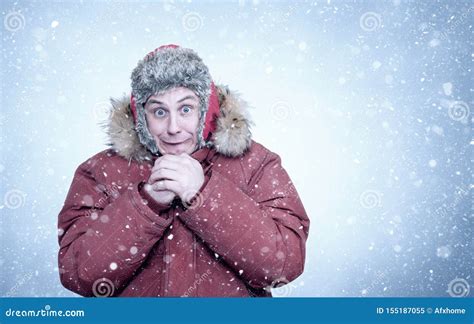 Frozen Man In Red Winter Clothes Warming Hands Cold Snow Frost