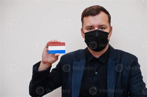 European Man Wear Black Formal And Protect Face Mask Hold Netherlands