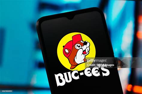 In This Photo Illustration The Buc Ees Logo Is Seen Displayed On A