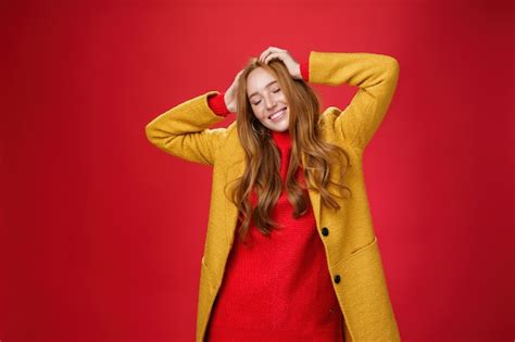 Free Photo Carefree Happy Ginger Girl Carrying Away With Music And