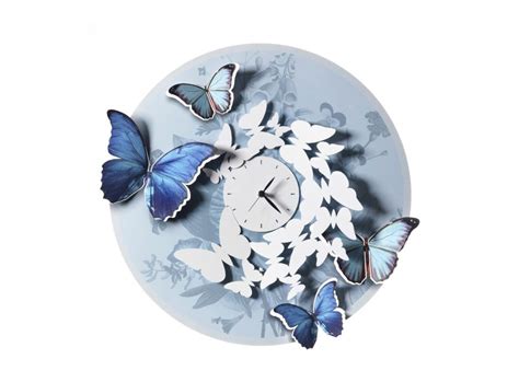 Horloge avec décoration papillon en différentes finitions