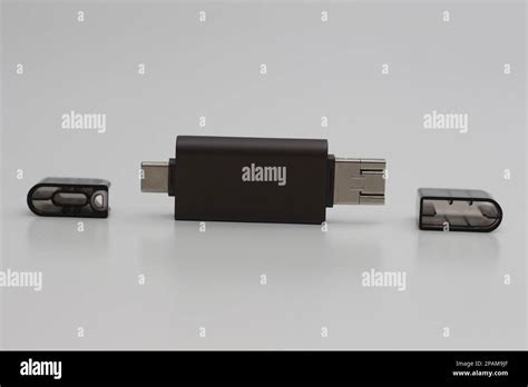 A Close Up Of Multifunction USB OTG Adapter Type A To Type C And Micro USB Type Which Is Gray