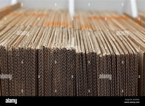 Stack Of Corrugated Cardboard For Packaging Detail Of Uneven Stack Of