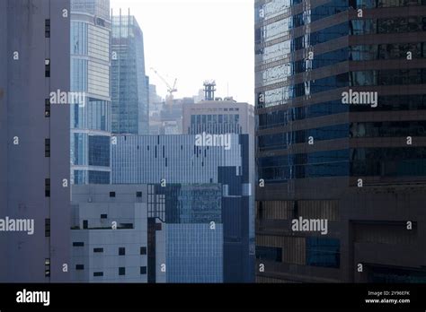 Hong Kong City Scape Taken From The Water Showing The Bridges And