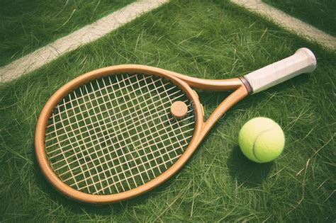Racket And Ball Become Vessels For Adventure And Exploration Stock