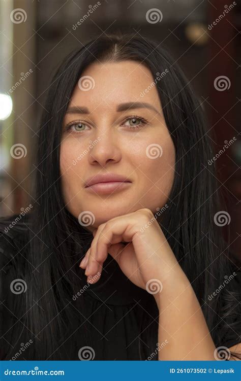 Portrait Of A Beautiful Year Old Woman With Long Hair Indoors Close