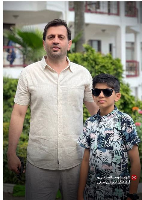 تصویر باکیفیت از شهید رضا امینی به همراه فرزندش شهید امیرعلی امینی