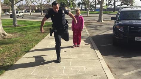Watch A Middle Aged Cop Teach An 11 Year Old Homeless Girl How To Play