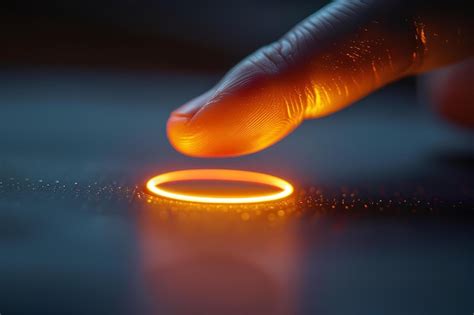 Premium Photo A Person Touching A Glowing Object On A Table With A