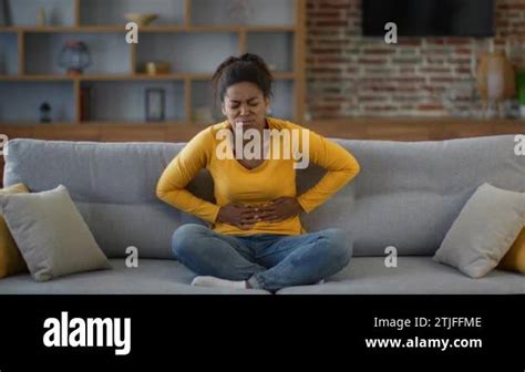 Period Pain Young Upset African American Woman Suffering From Terrible